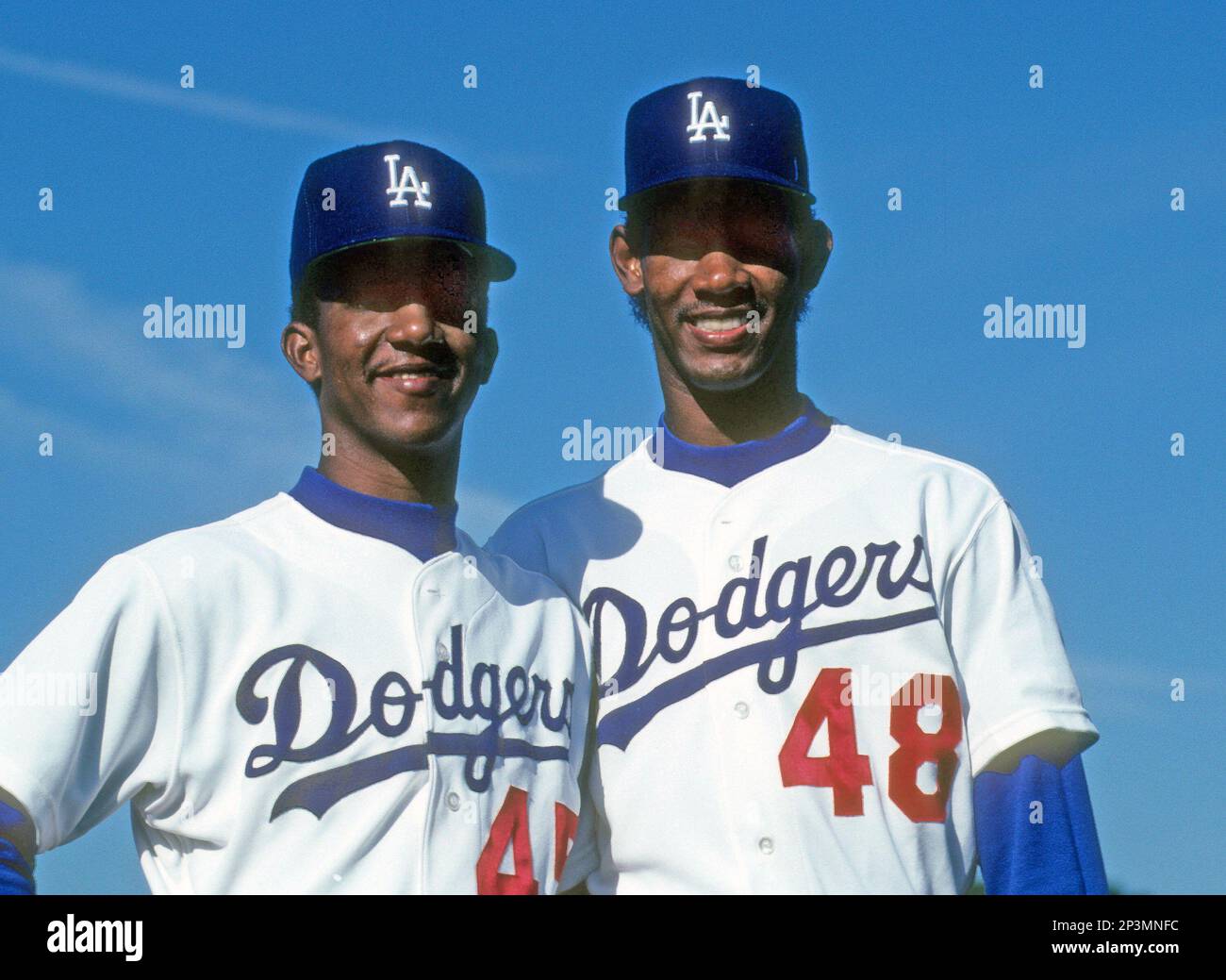 Pitchers Pedro (left) and Ramon Martinez of the Los Angels Dodgers pose during spring training ...