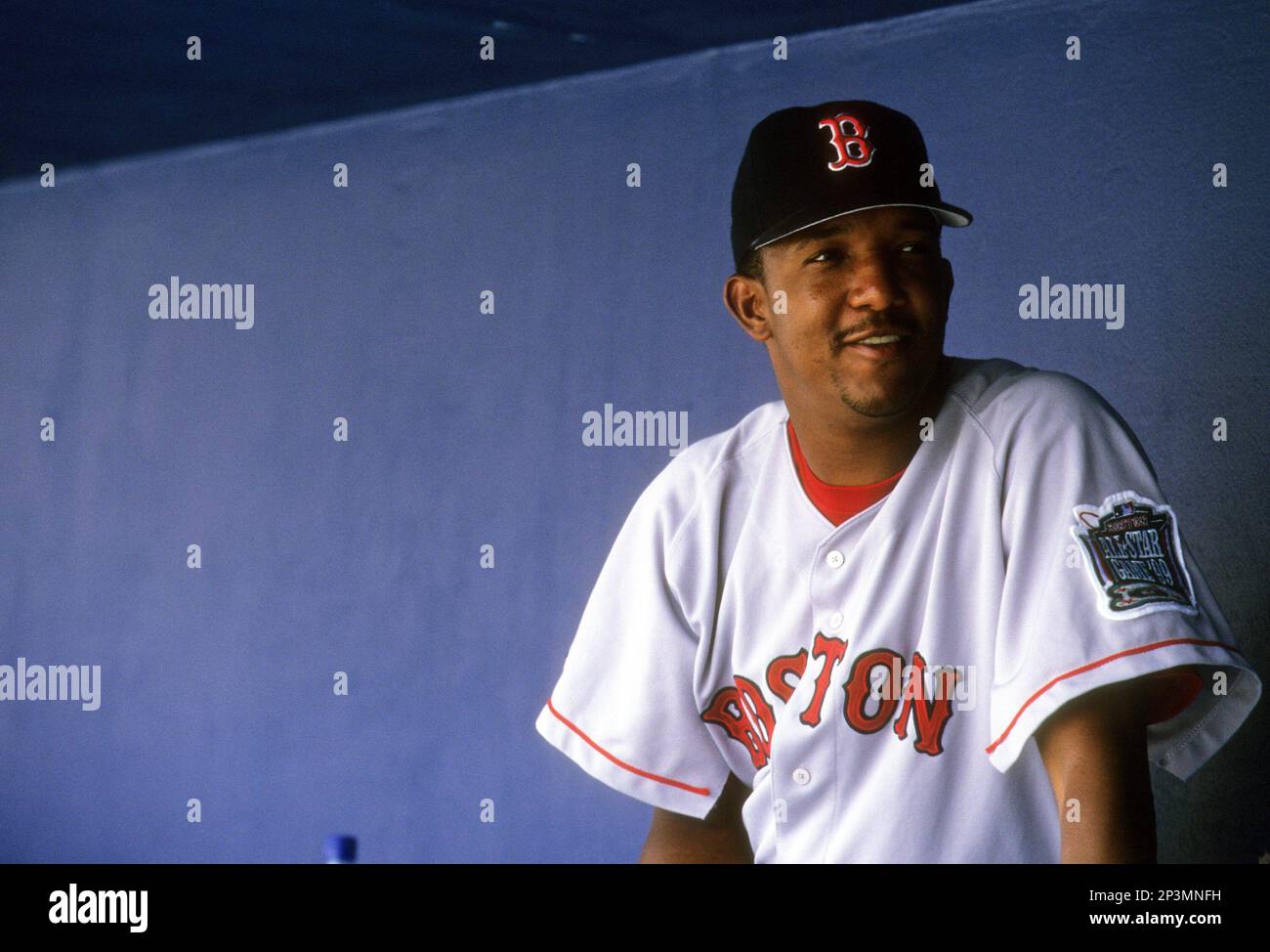 Pitcher Pedro Martinez of the Boston Red Sox in the dugout before play ...