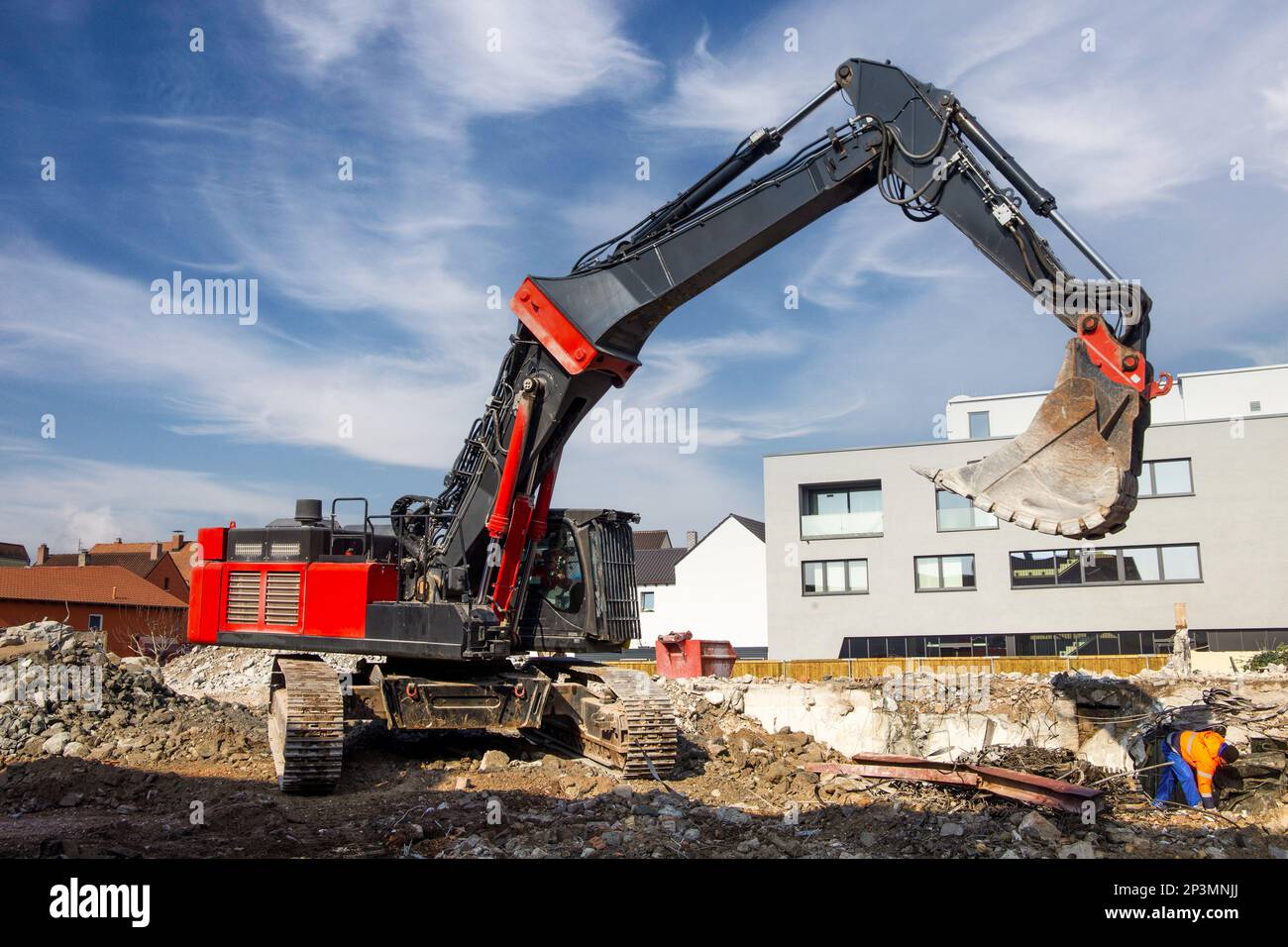 Demolition excavator in action Stock Photo - Alamy