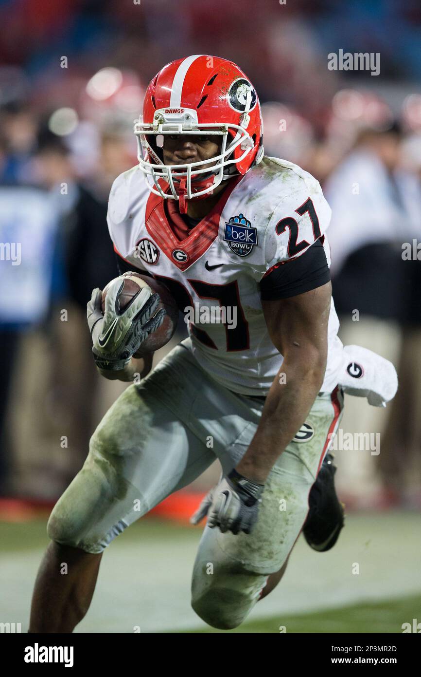 Nick Chubb (27) of the Georgia Bulldogs runs with the football during ...