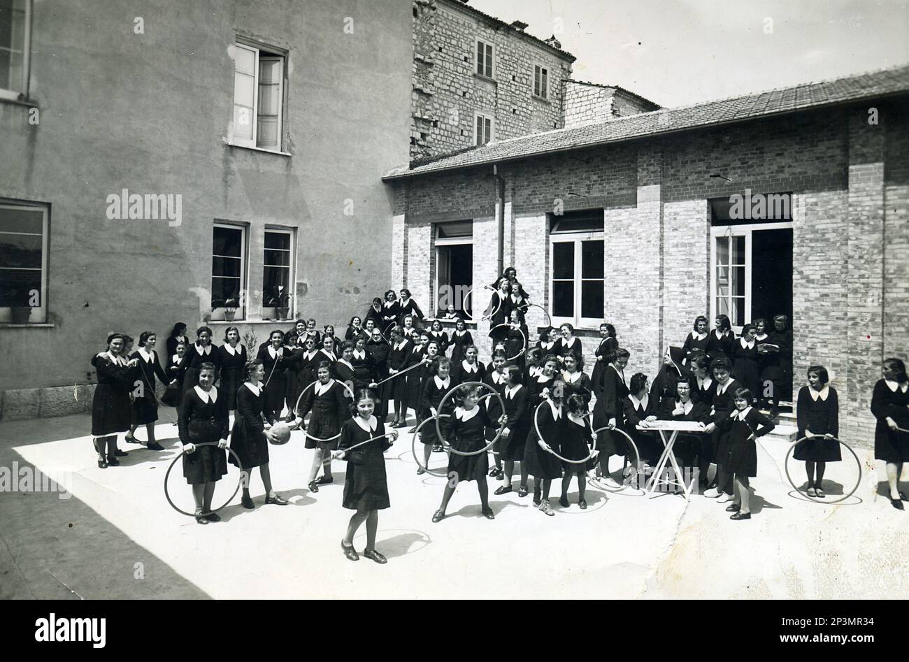 Female school photo in the gymnasium classroom, Italy, 40's Stock Photo ...