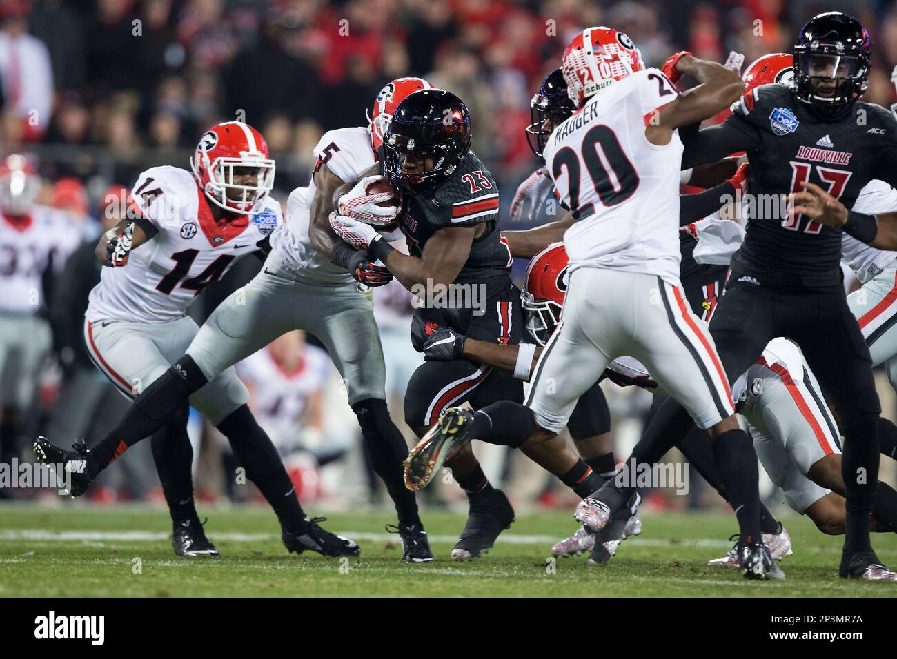Brandon Radcliff (23) of the Louisville Cardinals runs with the ...
