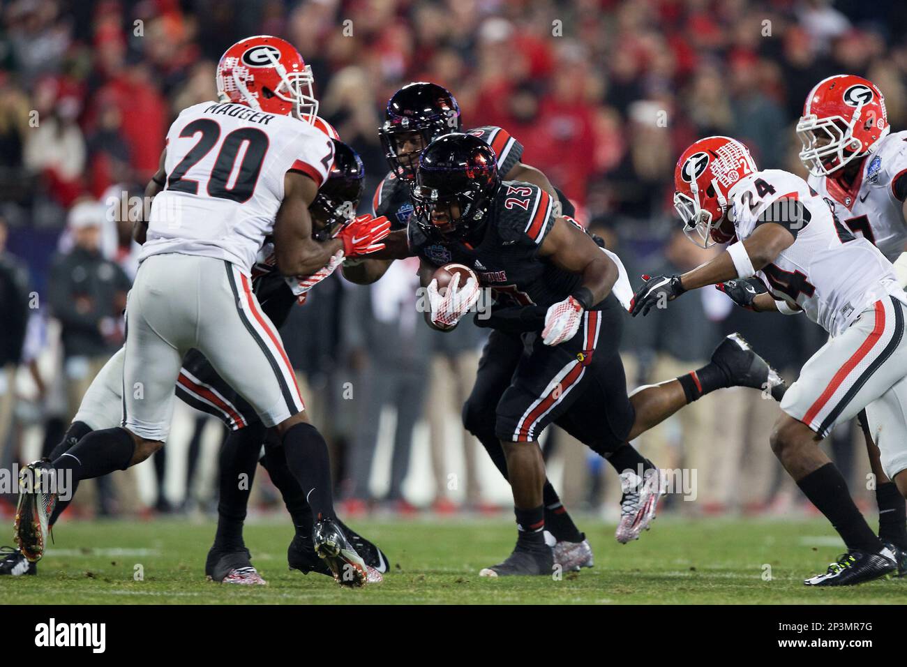 Brandon Radcliff (23) of the Louisville Cardinals runs with the ...