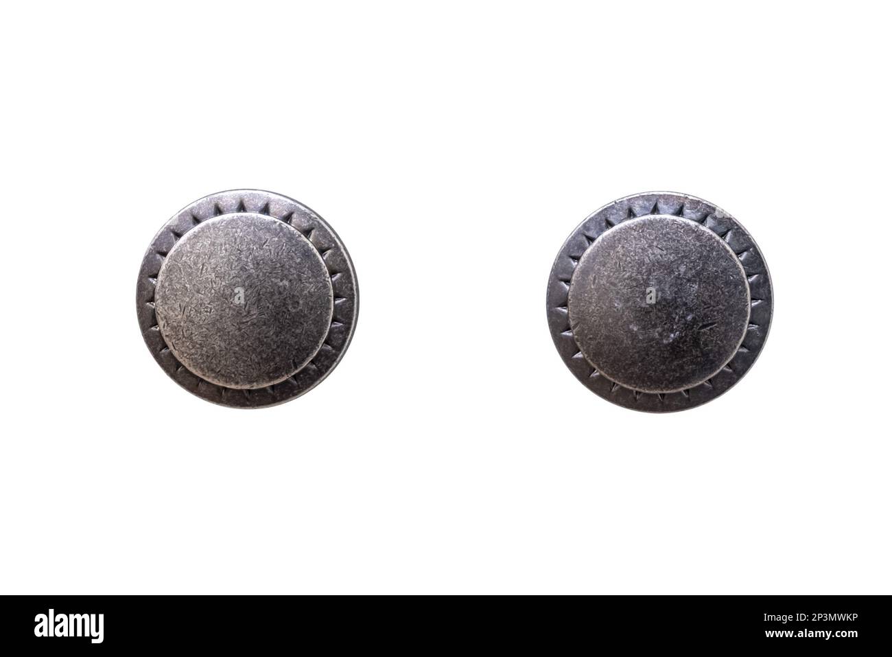 Metal round handles on a white half-open door, isolated on a white ...