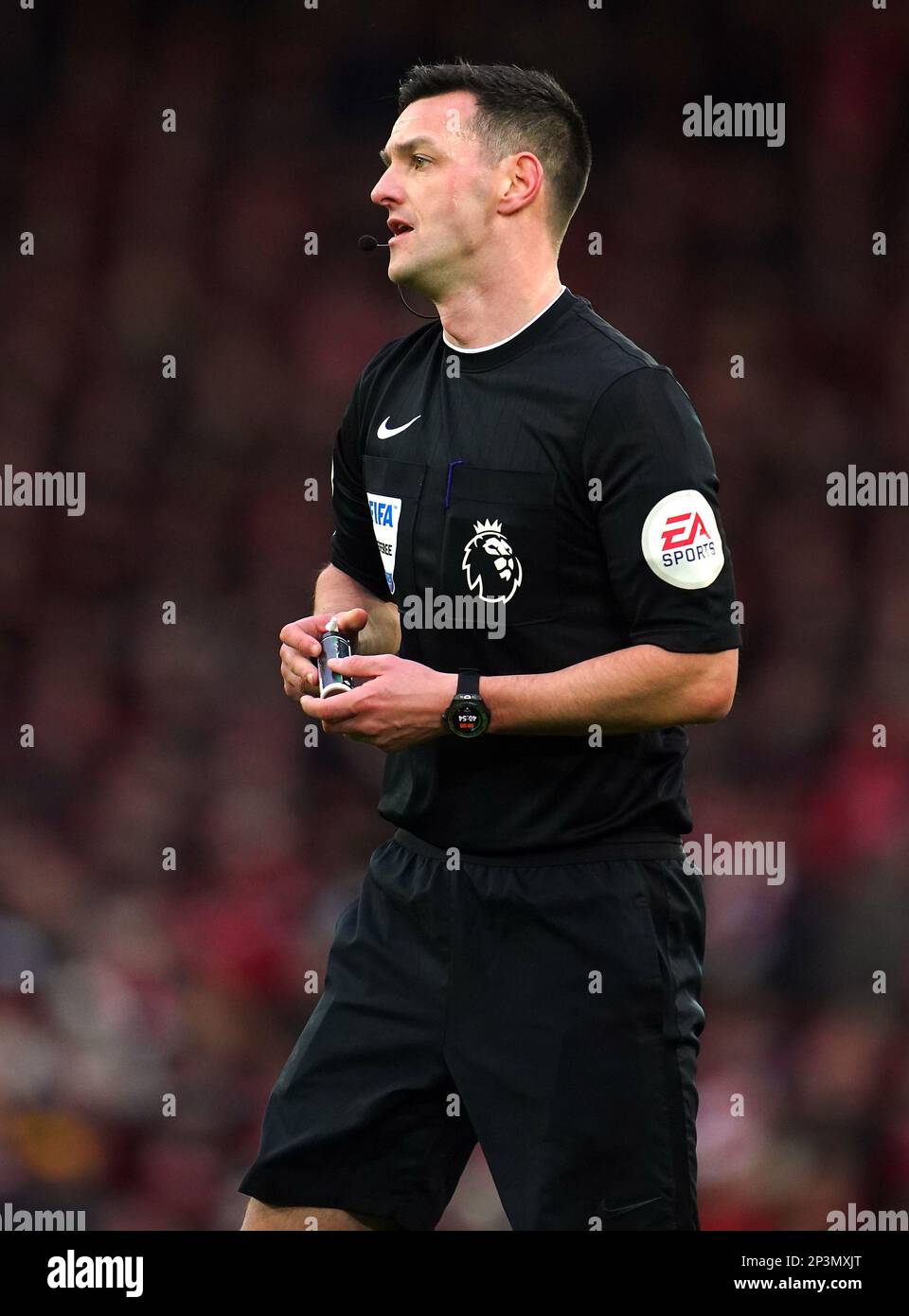 Referee Andrew Madley during the Premier League match at Anfield ...