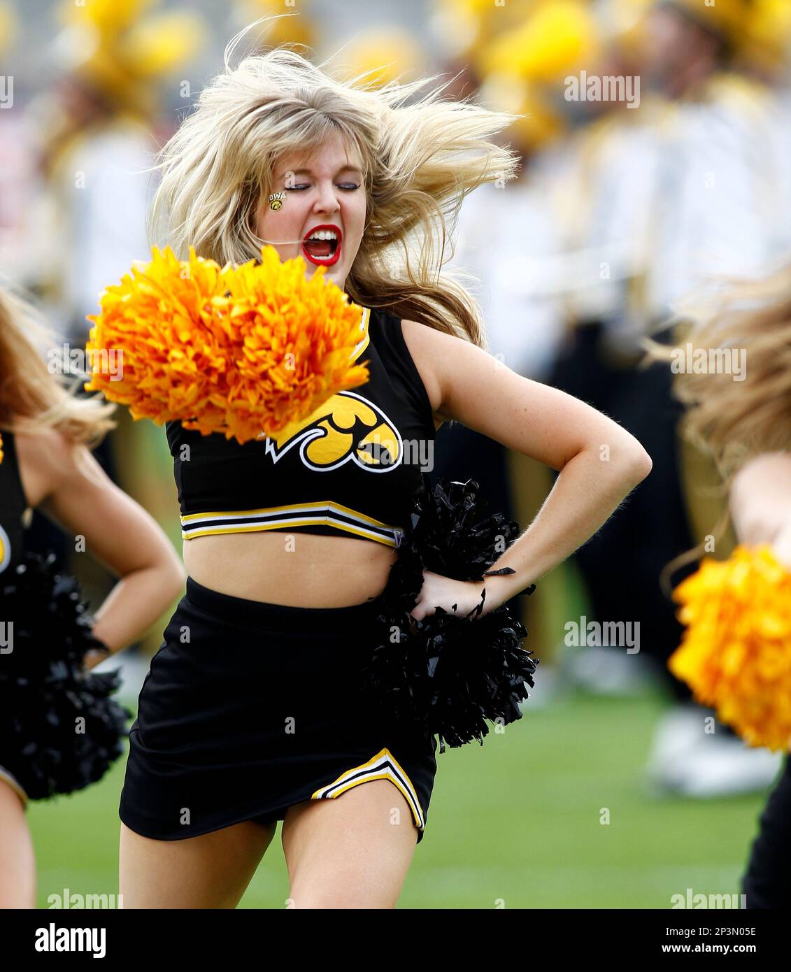 January 02 2015: A Iowa Hawkeyes cheerleader cheering during the game ...