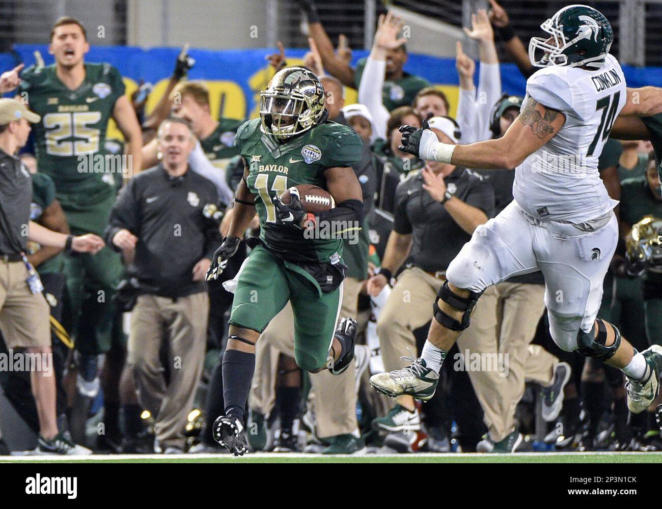 Baylor Bears linebacker Taylor Young (11) gets an interception as he ...