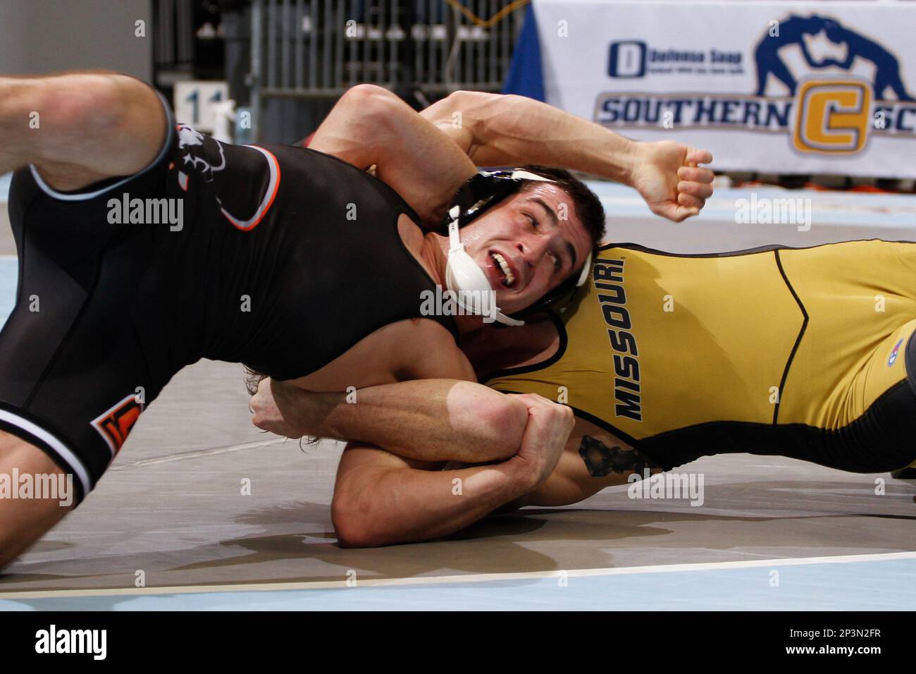 Oklahoma State's Joshua Kindig, left, wrestles Missouri's Drake ...