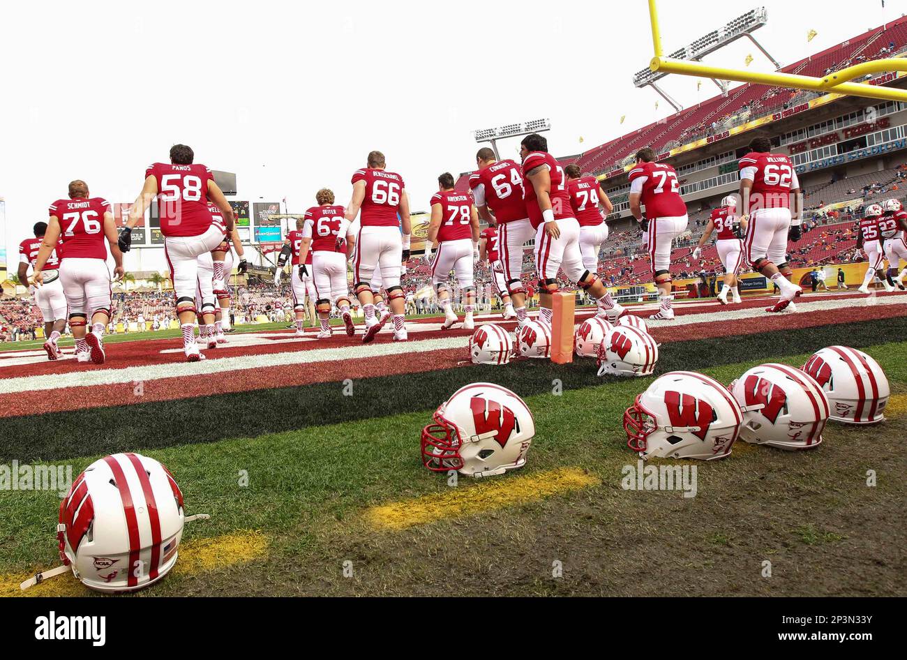 The Wisconsin Badgers start their warmups prior to the Outback Bowl ...