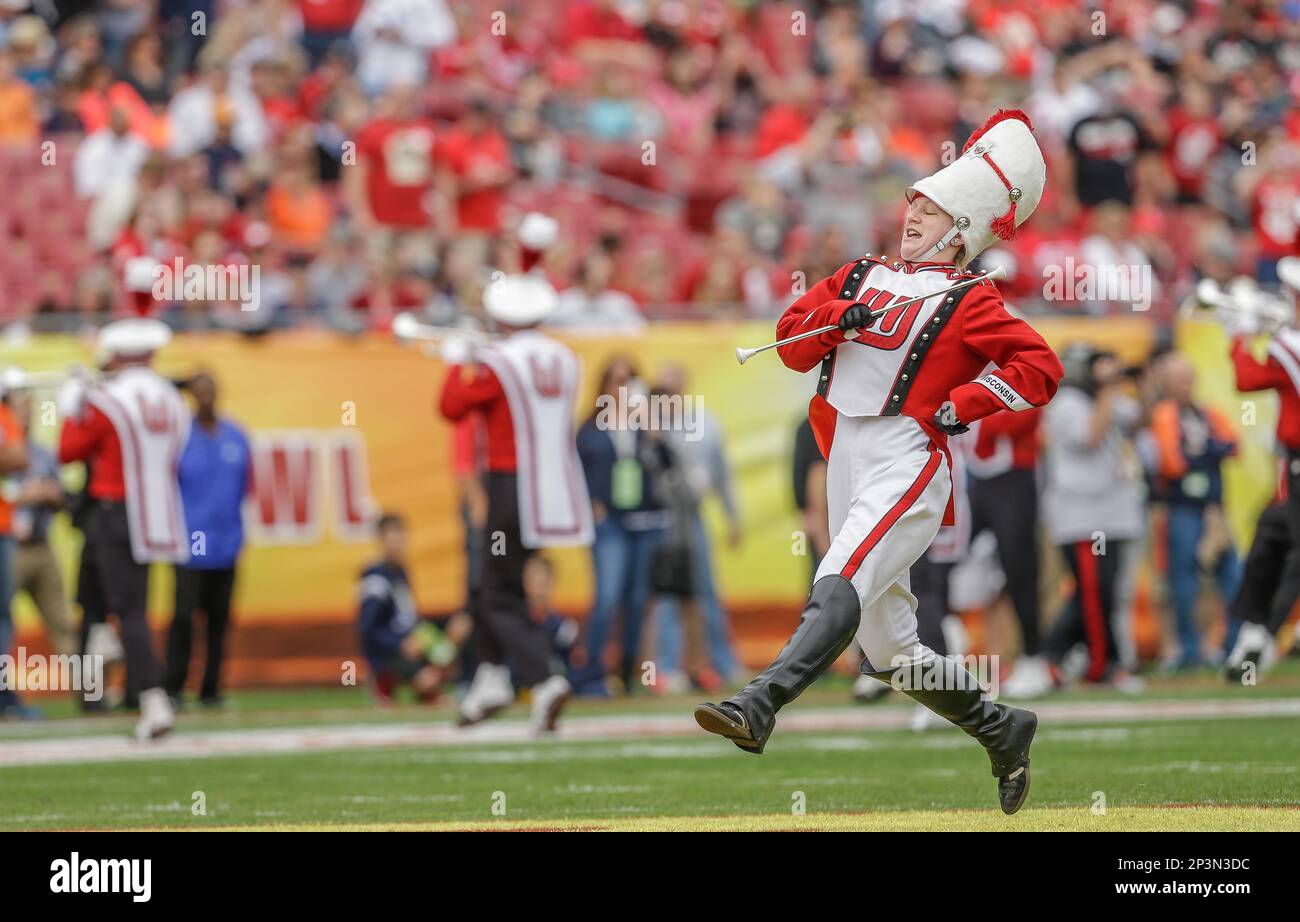 The Wisconsin Badger band drum major entertains the crowd prior to the ...