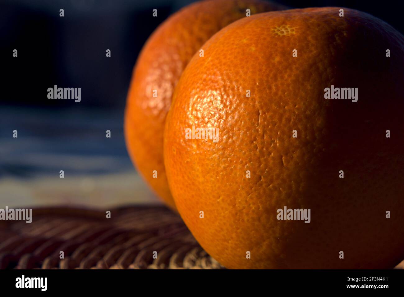 2 oranges on the right with space on the left Stock Photo - Alamy