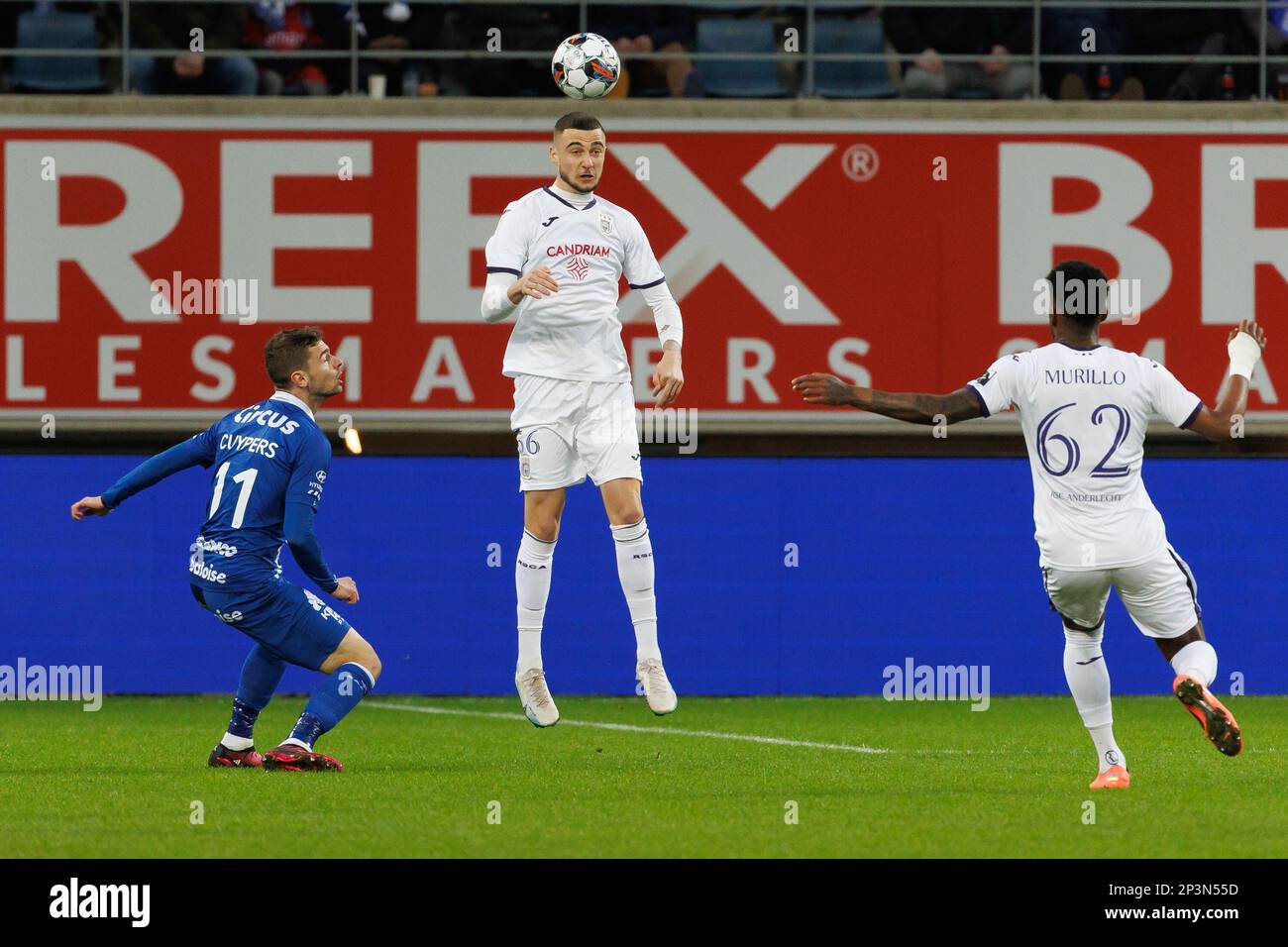 Gent's Hugo Cuypers and Anderlecht's Zeno Debast fight for the ball ...