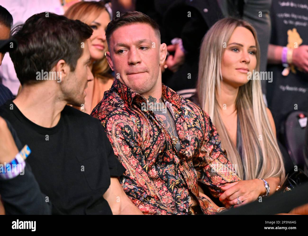 Jake Gyllenhaal, Conor McGregor and Dee Devlin, from left, attend a UFC ...