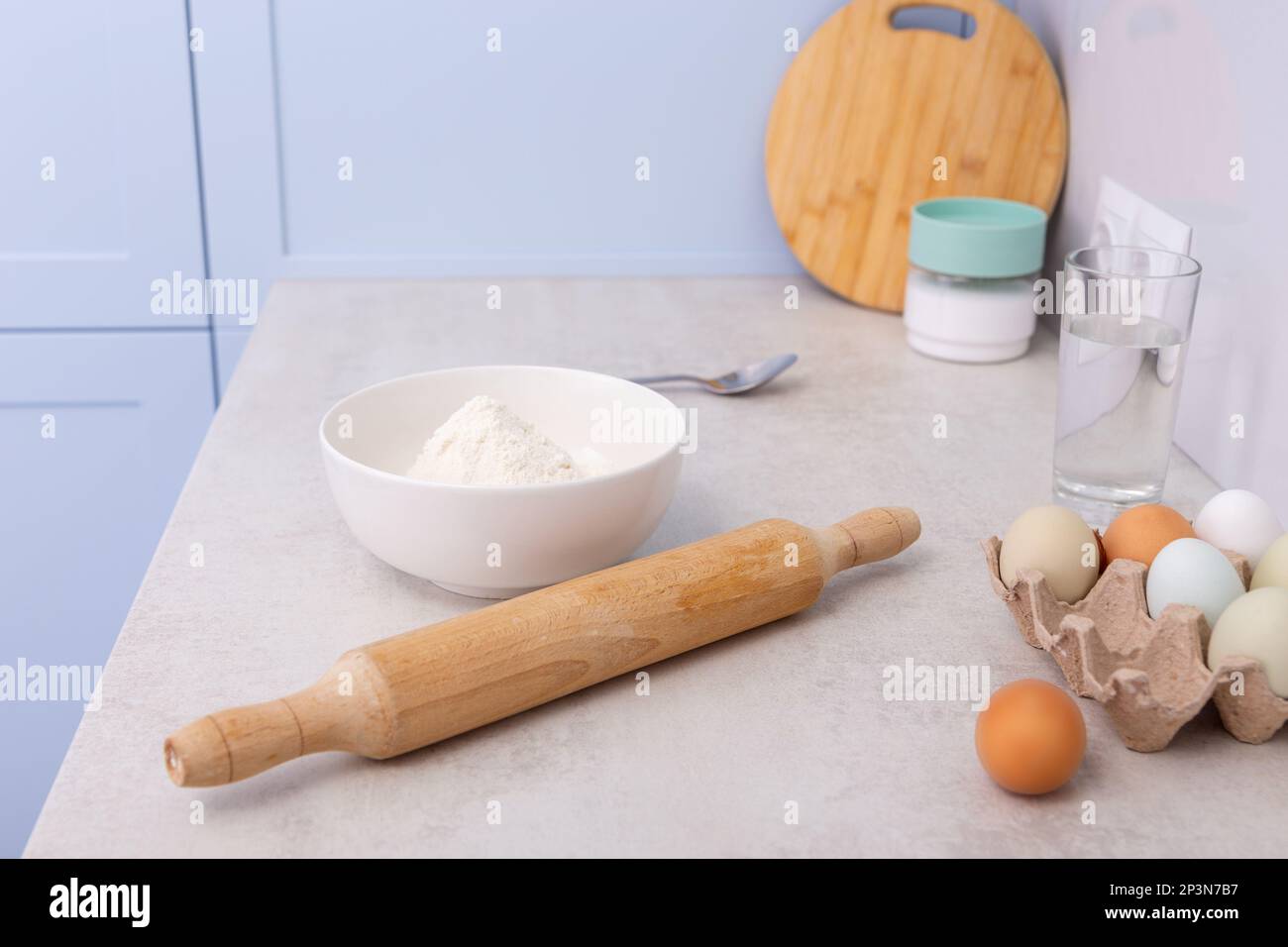 Baking cake in modern kitchen - dough recipe ingredients (eggs, flour ...