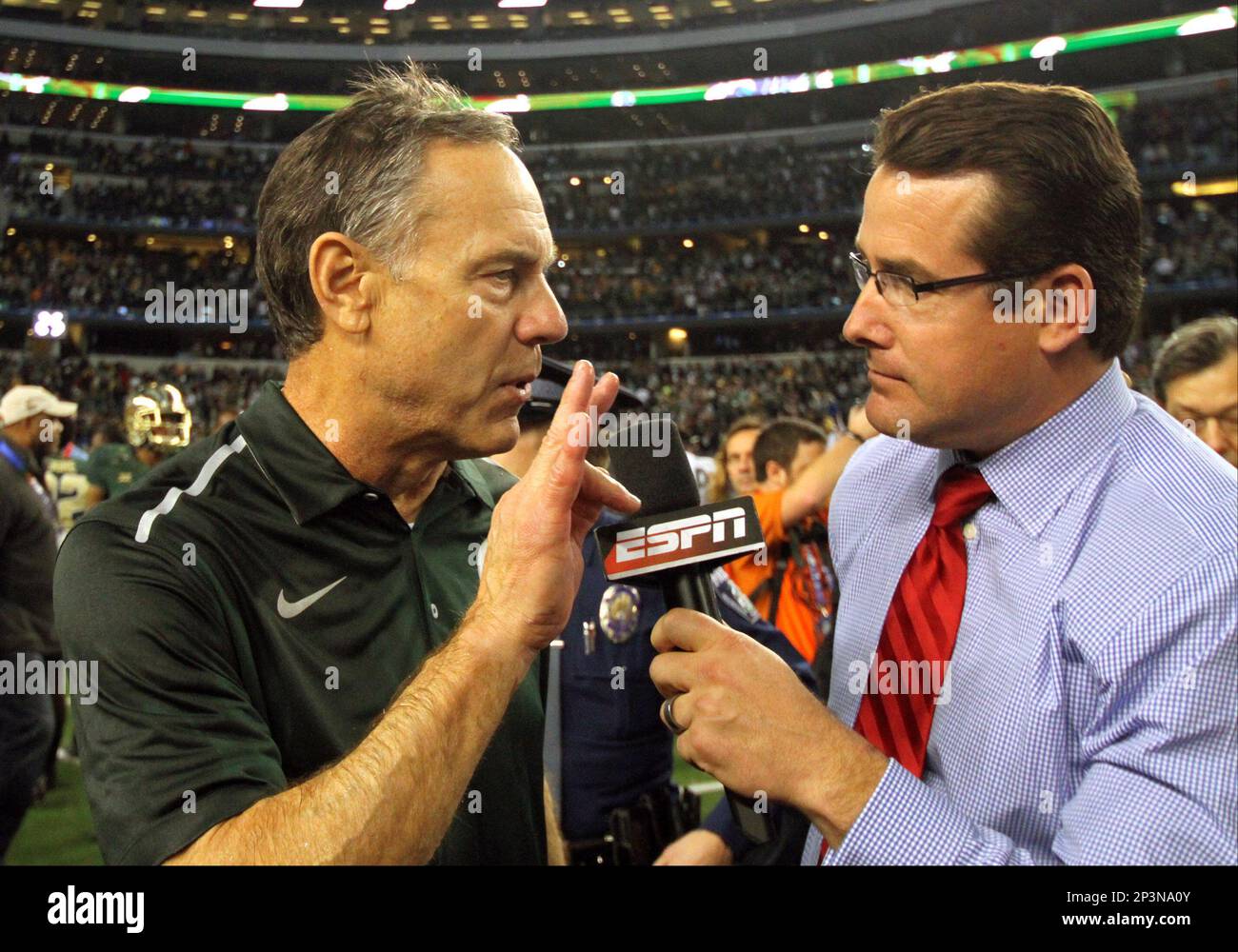 01 January 14: Michigan State Spartans head coach Mark Dantonio does an ...