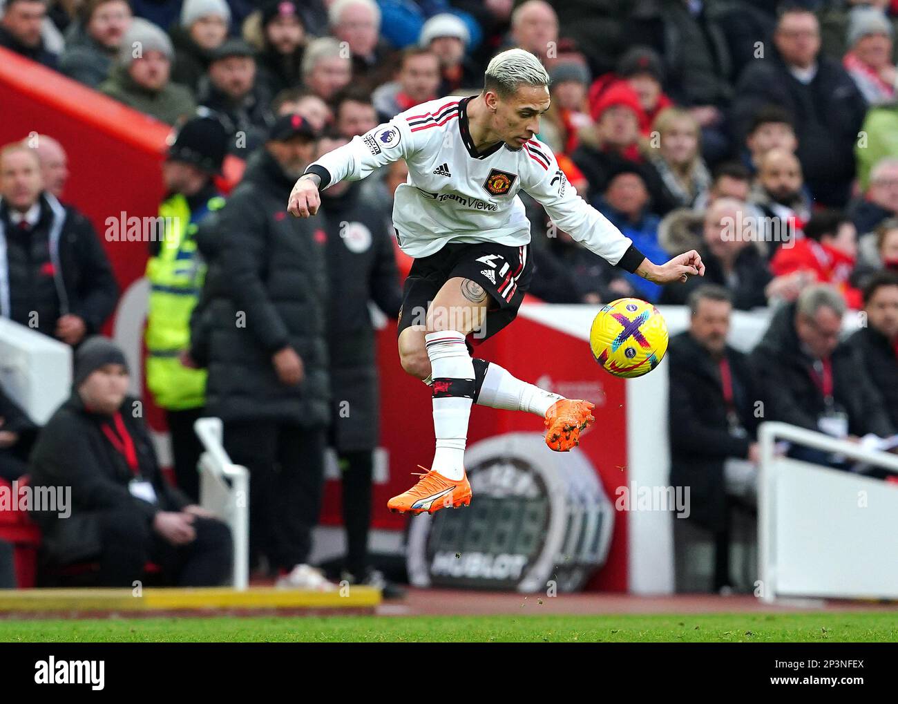Manchester United's Antony controls the ball in the air during the ...