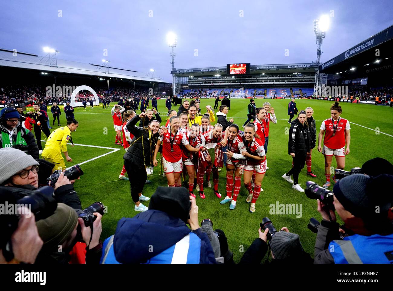 Arsenal players pose for photos with the Continental Tyres League Cup ...