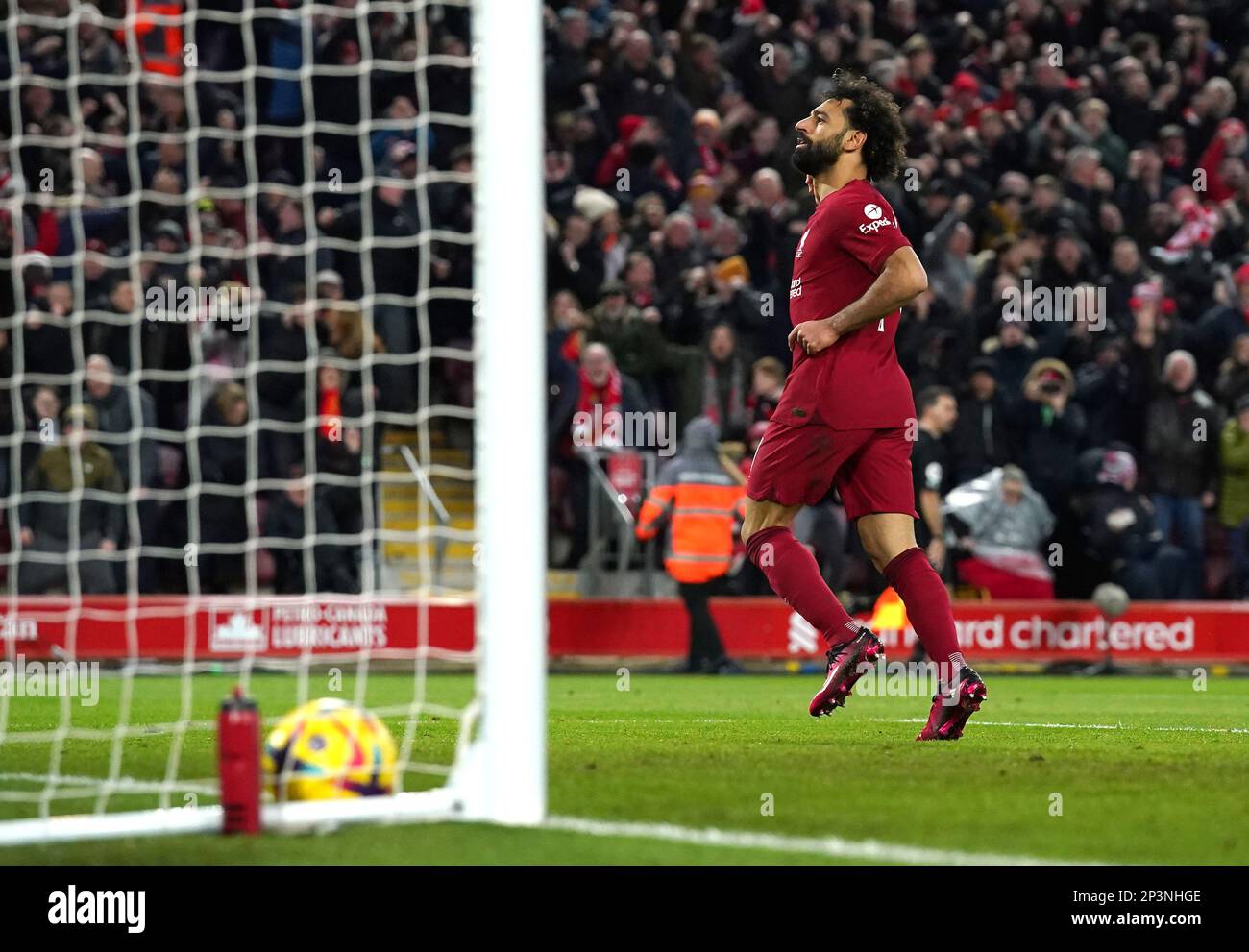 Liverpool's Mohamed Salah (right) celebrates scoring their side's ...