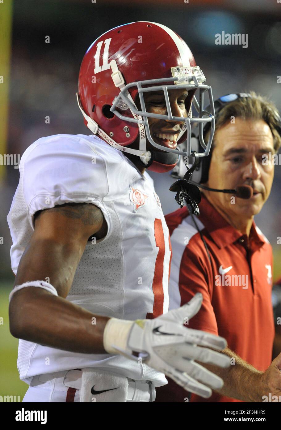 Coach Nick Saban and wide receiver Brandon Gibson (11) of the Alabama ...