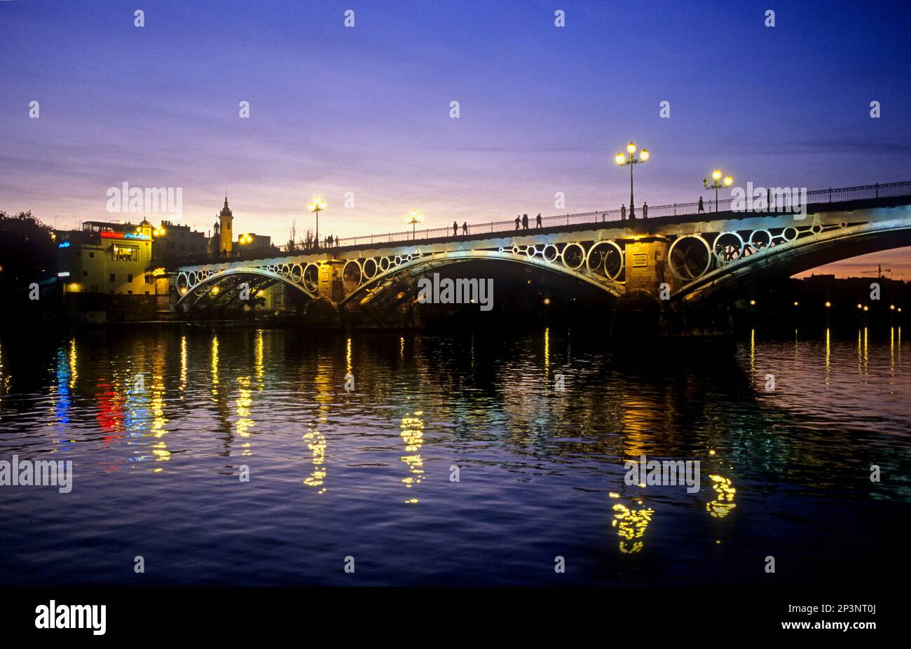 Isabel II bridge or Triana bridge. From 1852. Guadalquivir river ...