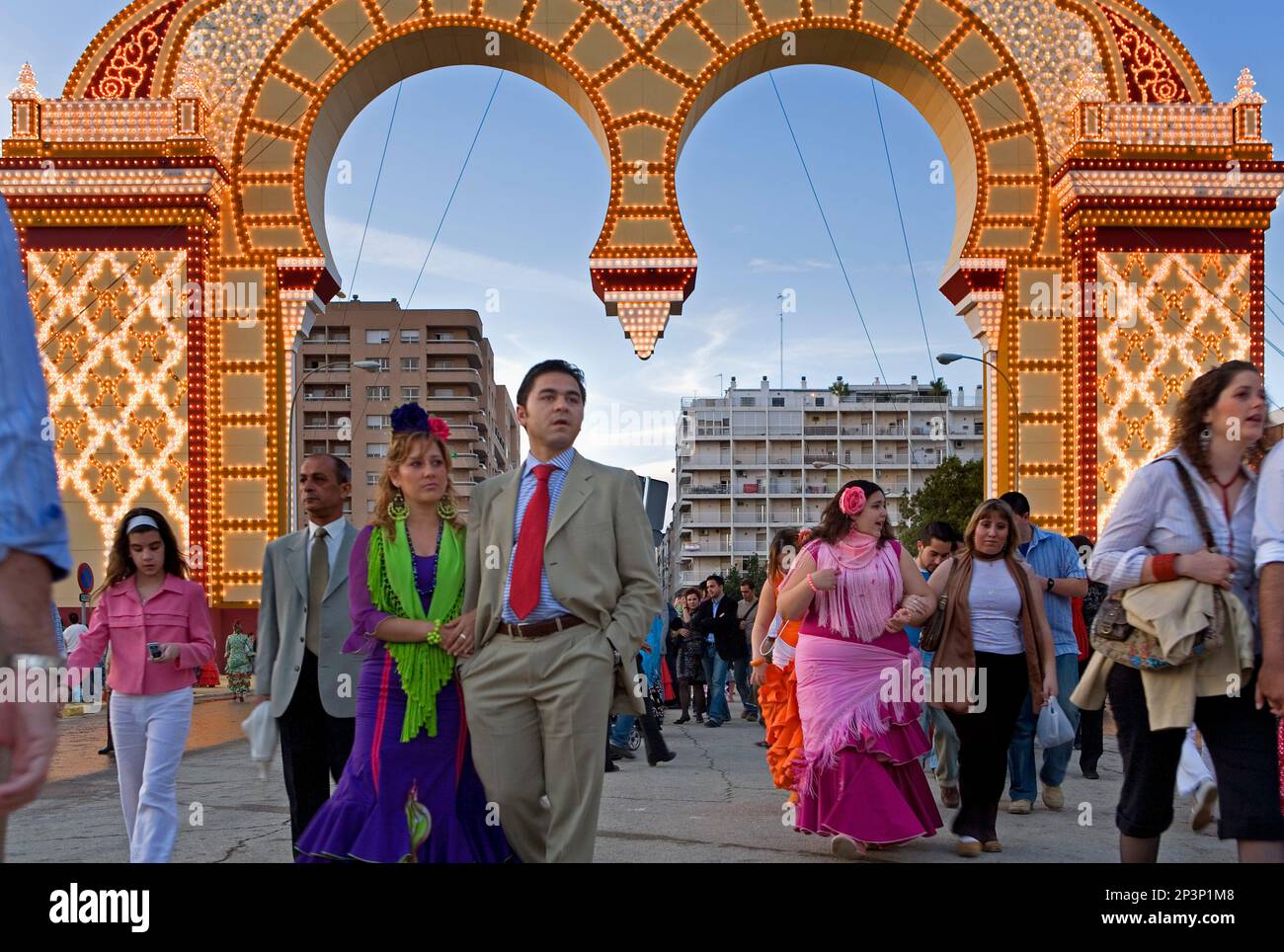 Feria de Abril (The April Fair). "El Real". People in Main gate ...