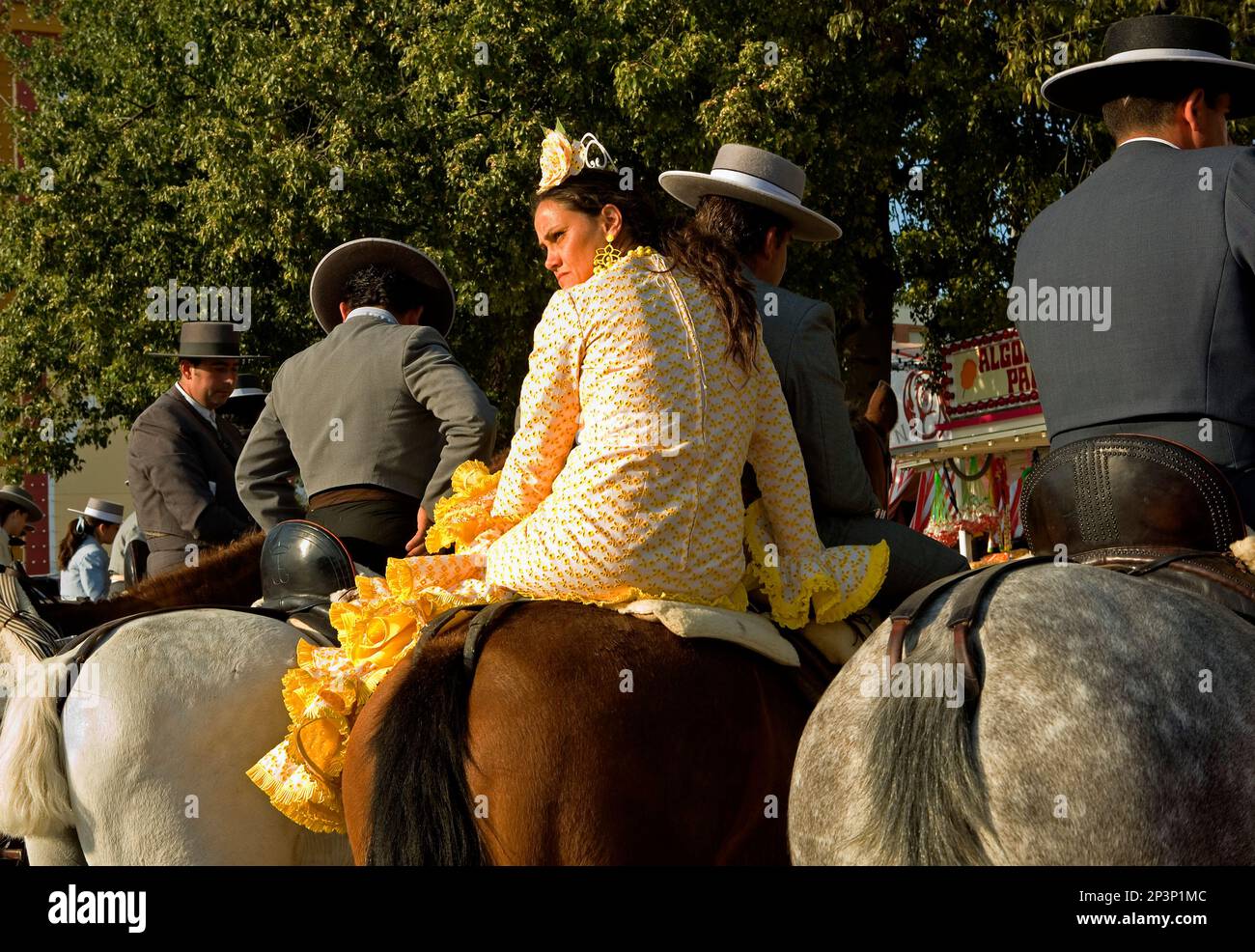 Feria de Abril (The April Fair). "El Real". Woman wearing traditional ...