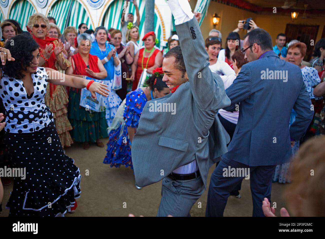 Feria de Abril (The April Fair). "El Real". People dancing at a ...