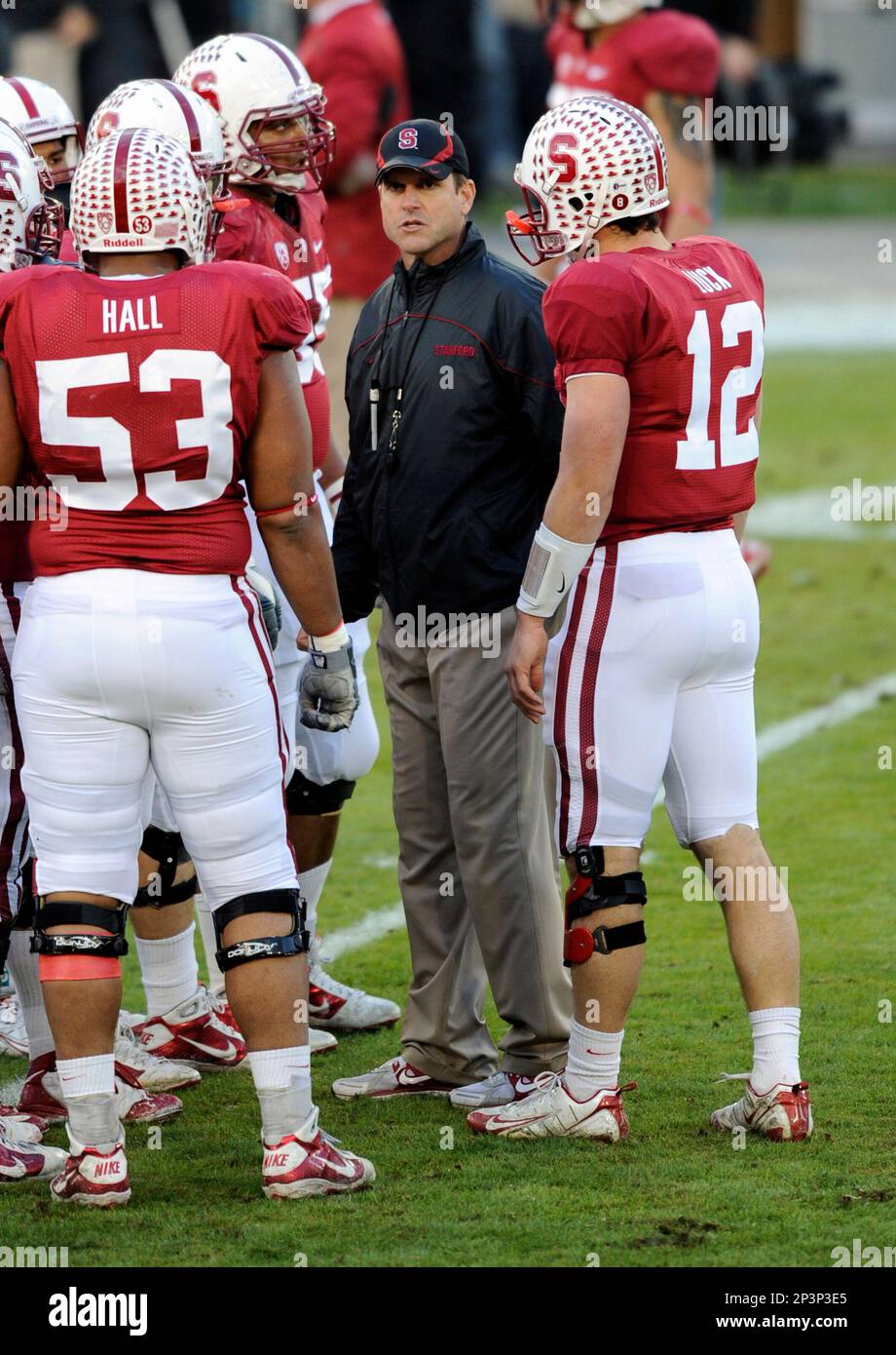 27 November 2010: Stanford quarterback Andrew Luck (12) and head coach ...