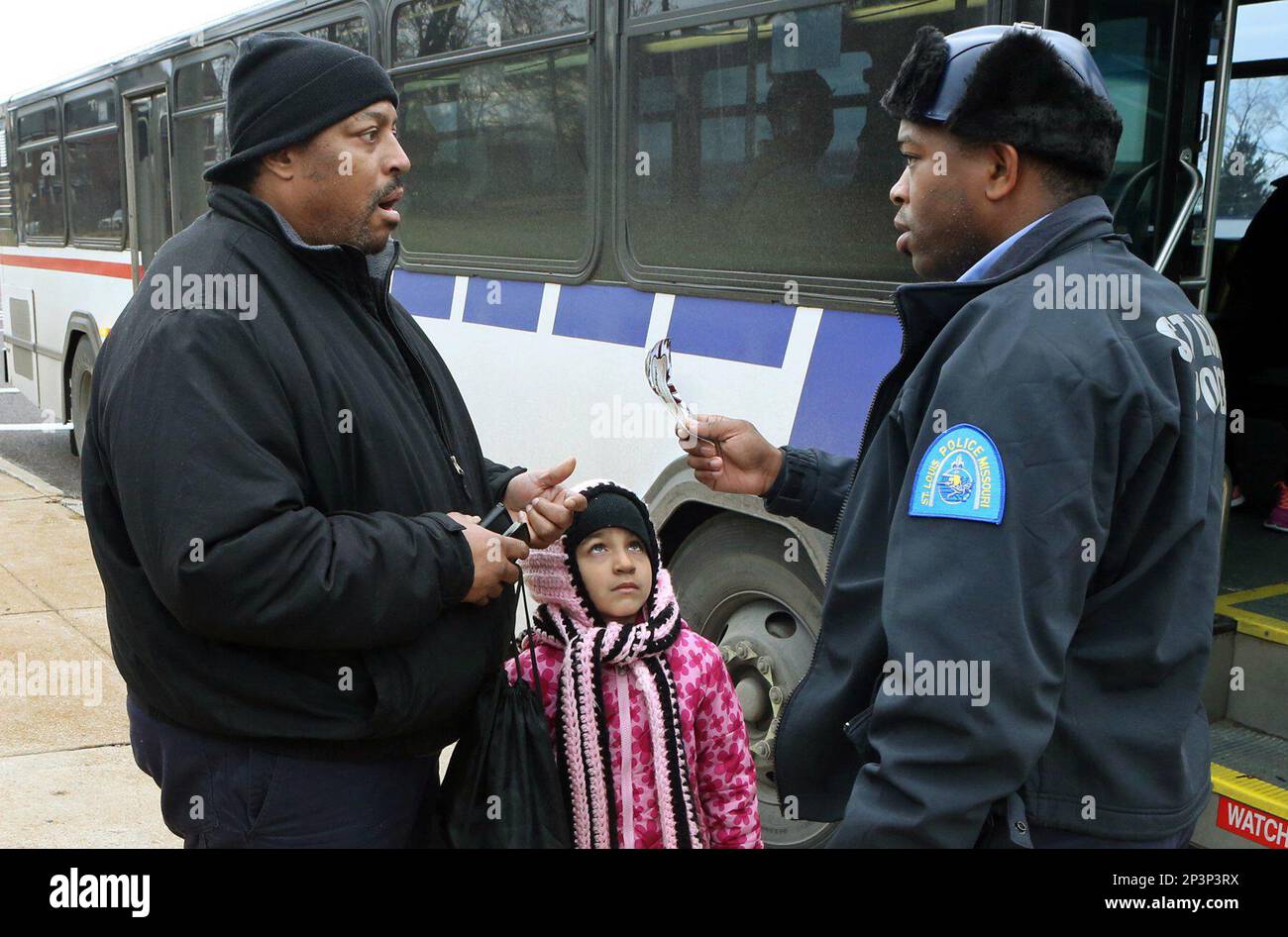 James Montgomery, left, is stunned when St. Louis Police officer Silas ...
