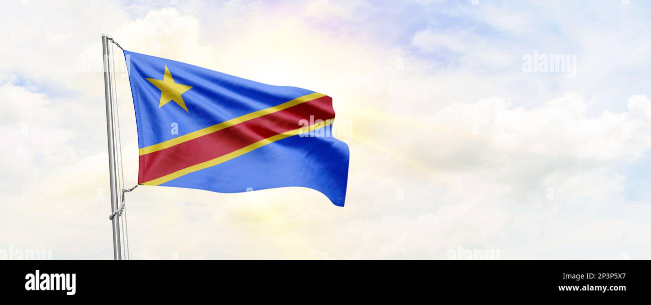Congo Democratic Republic flag waving on sky background. 3D Rendering ...