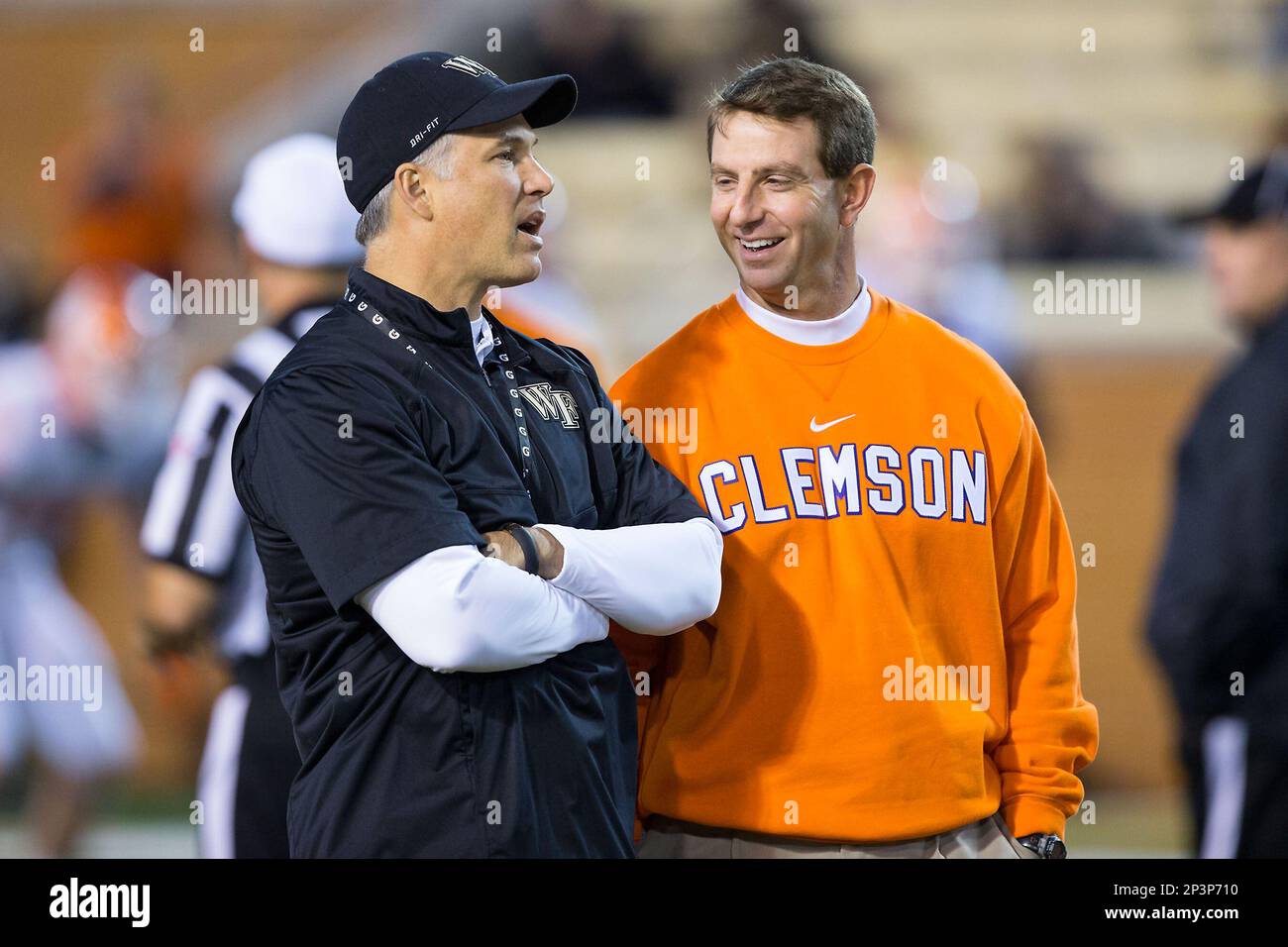 Wake Forest Demon Deacons head coach Dave Clawson chats with Clemson Tigers head coach Dabo ...