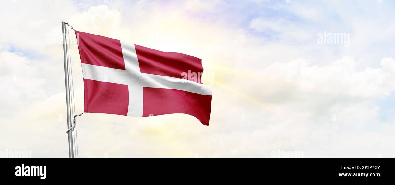 Denmark flag waving on sky background. 3D Rendering Stock Photo - Alamy