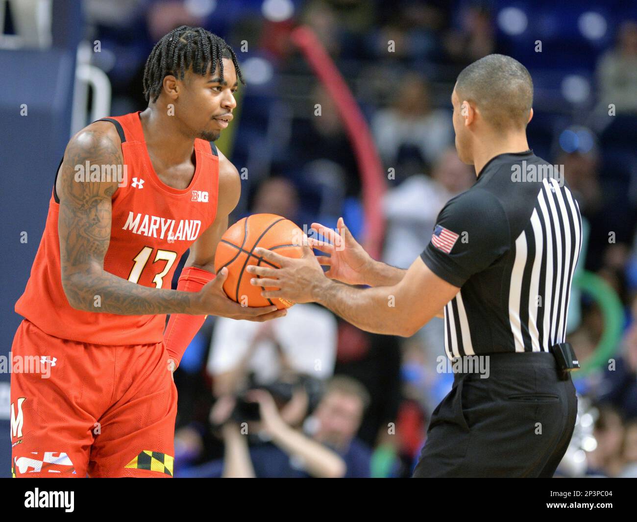 Maryland's Hakim Hart (13) hands the ball to an official after being ...