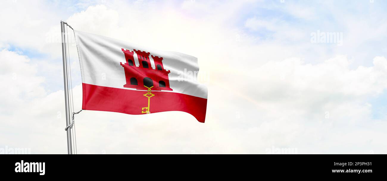 Gibraltar flag waving on sky background. 3D Rendering Stock Photo - Alamy
