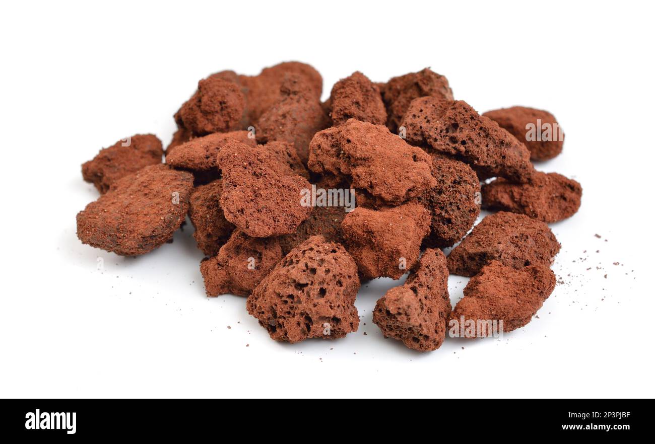Porous brown volcanic rock isolated on white background. Lava stone ...