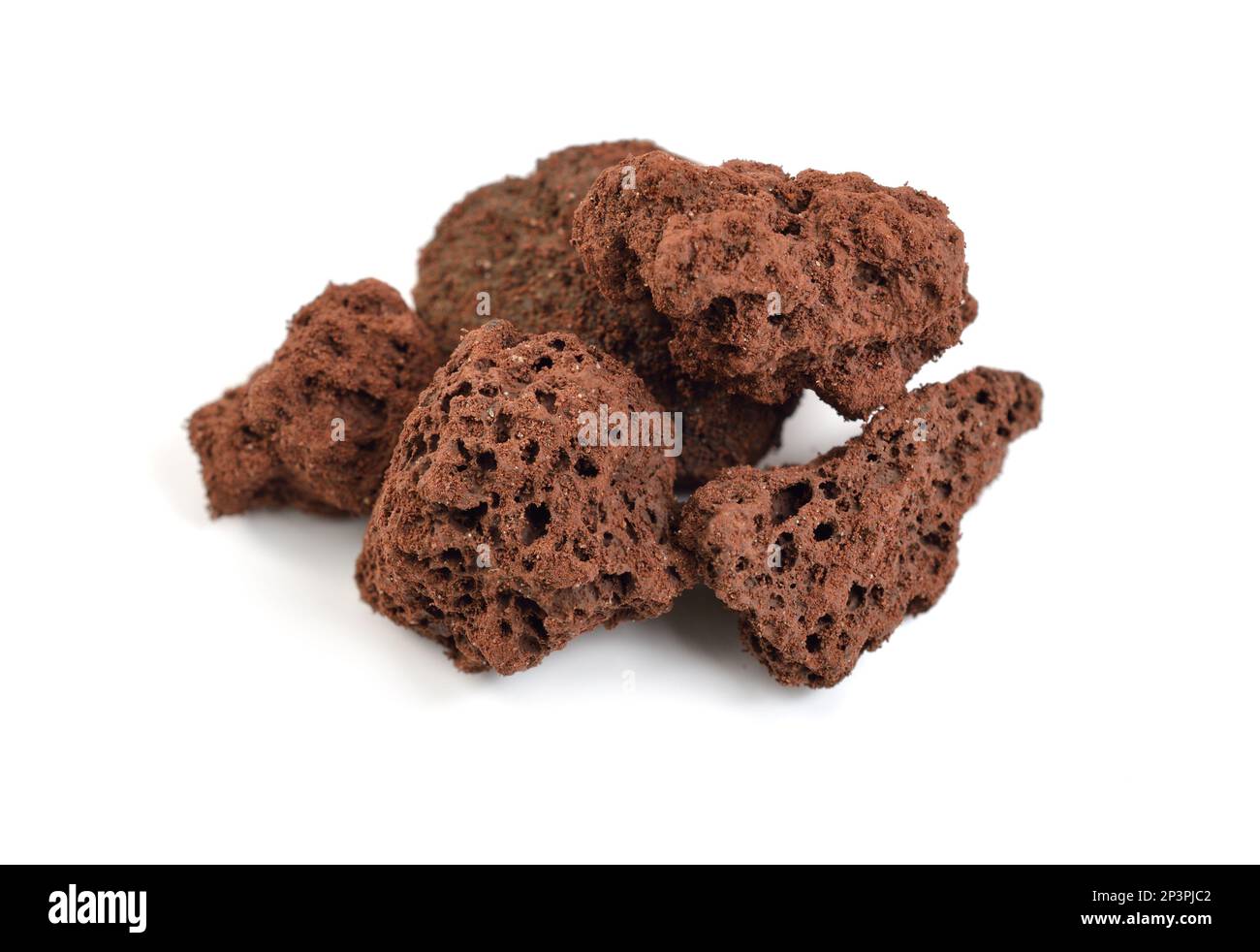 Porous brown volcanic rock isolated on white background. Lava stone ...