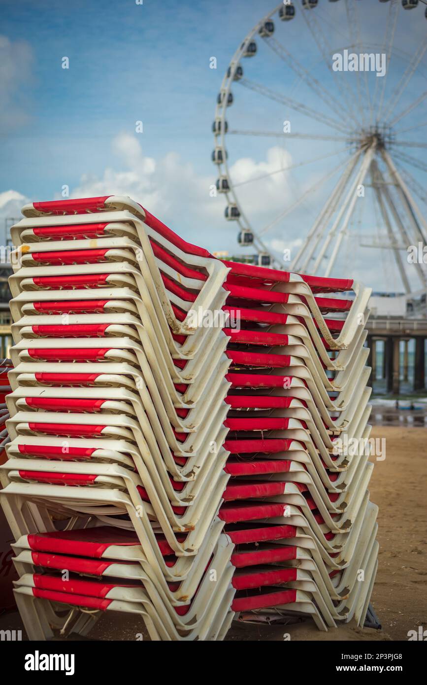 Amusement Park, with ferries wheel and bungy and beach chairs on the ...