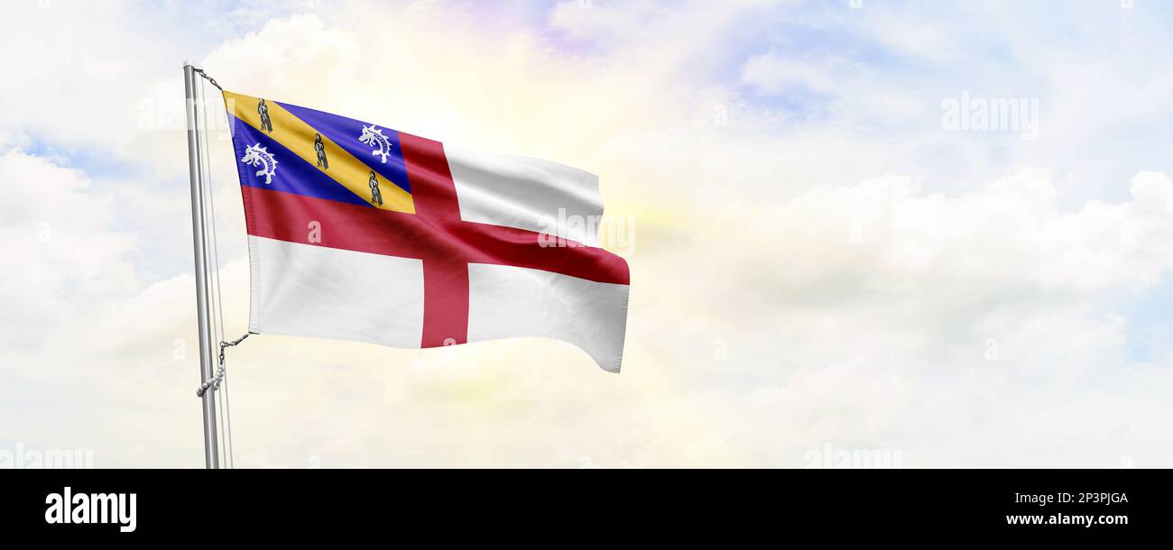 Herm flag waving on sky background. 3D Rendering Stock Photo - Alamy