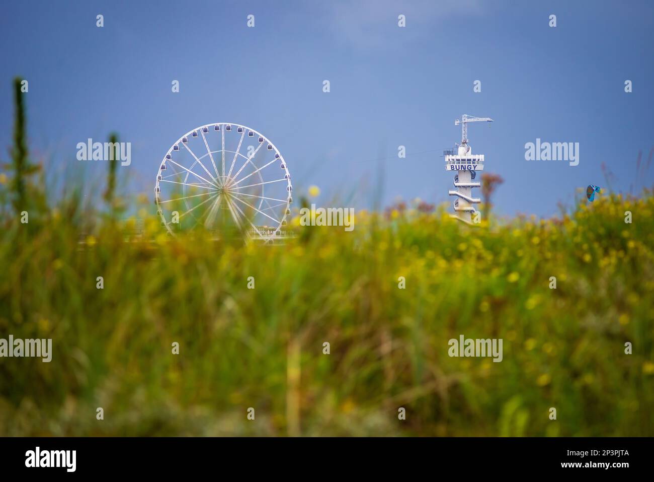 Amusement park, with ferries wheel and bungy on the Scheveningen ...