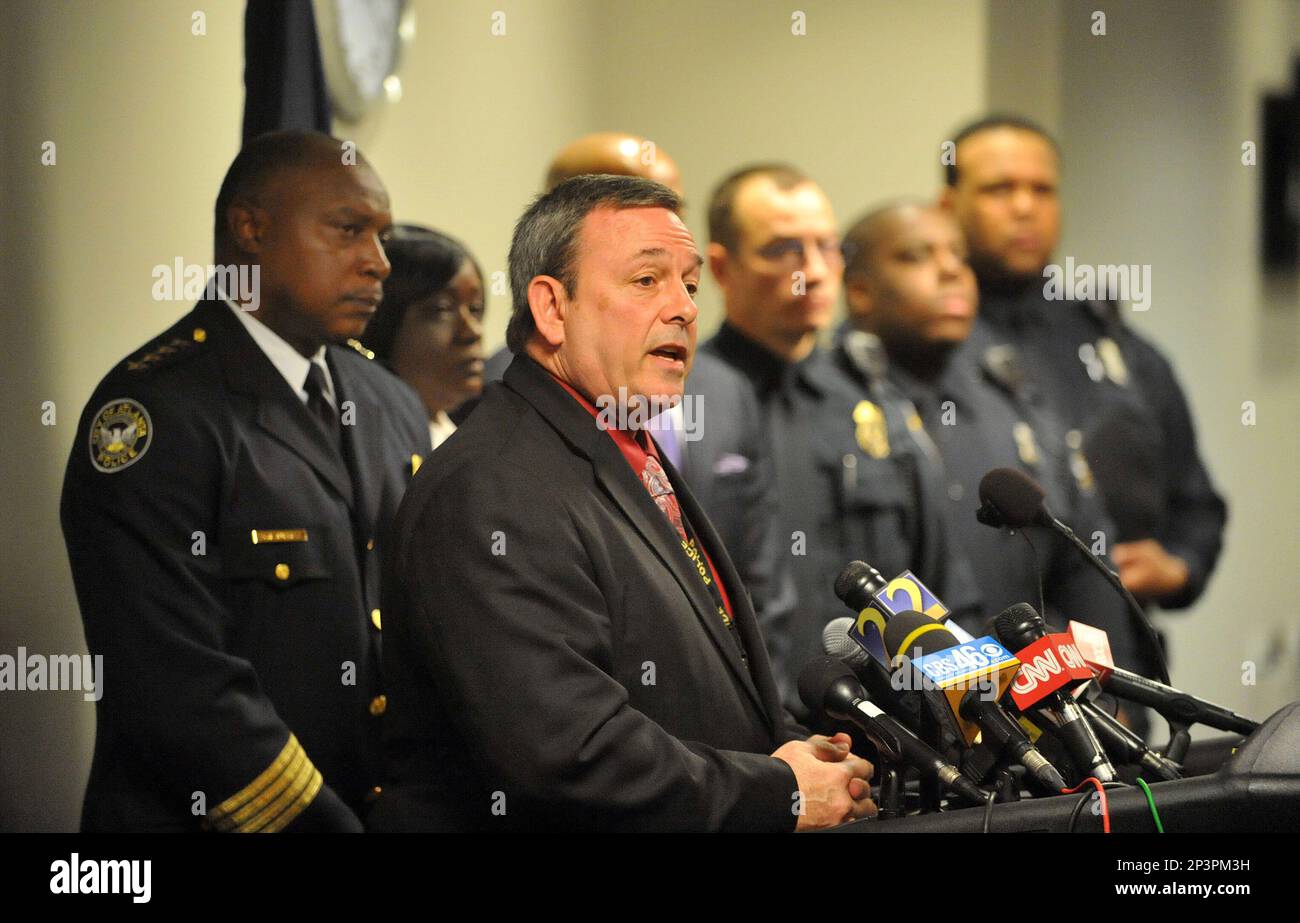 Atlanta Police Department Capt. Paul Guerrucci, foreground right ...