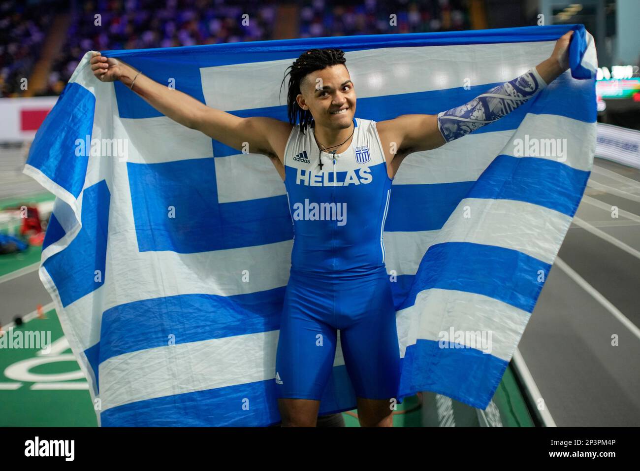 Emmanouil Karalis, of Greece, celebrates after winning the silver medal ...