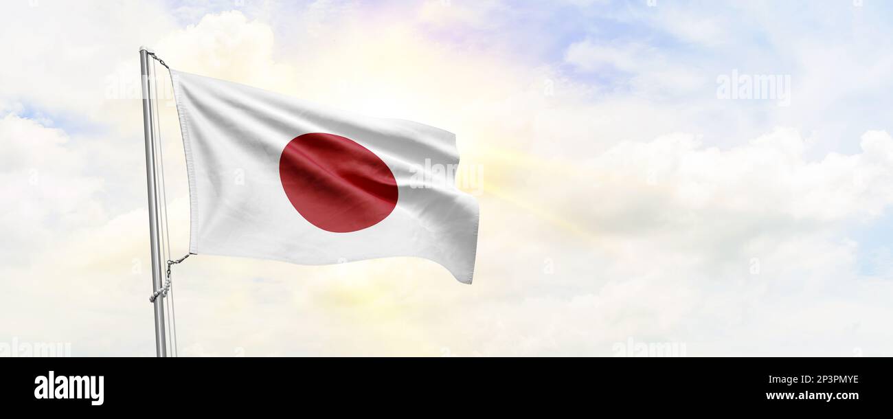Japan flag waving on sky background. 3D Rendering Stock Photo - Alamy