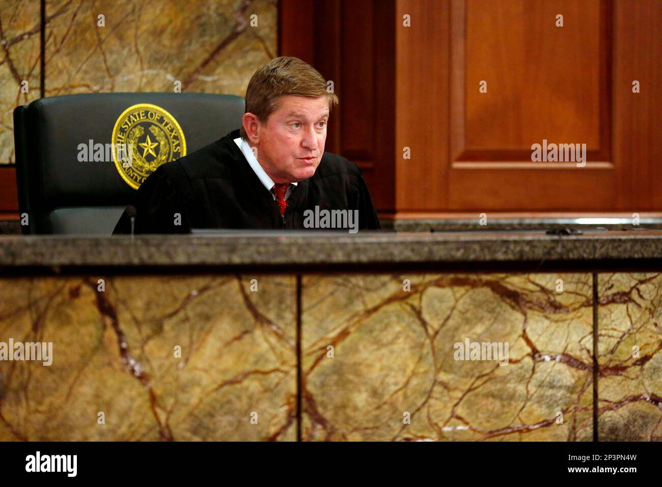 Judge Mike Snipes reacts to a line of questioning during the sentencing ...