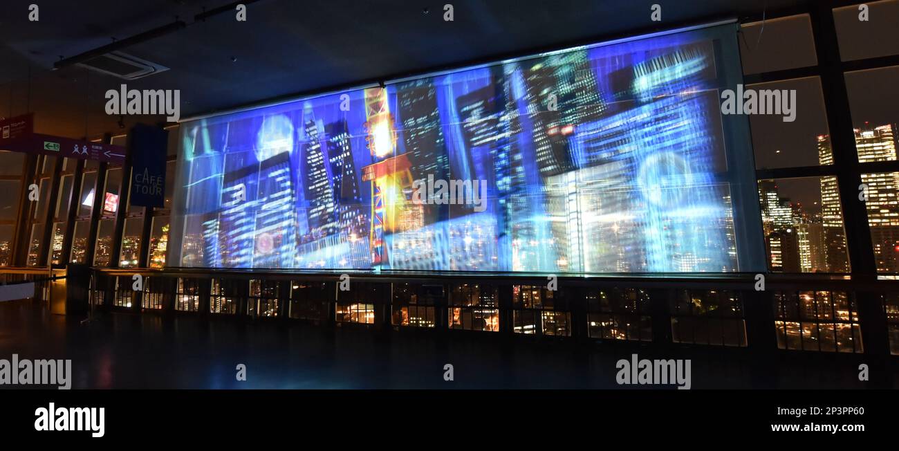 An image is reflected on a screen by 3D project mapping during Tokyo ...