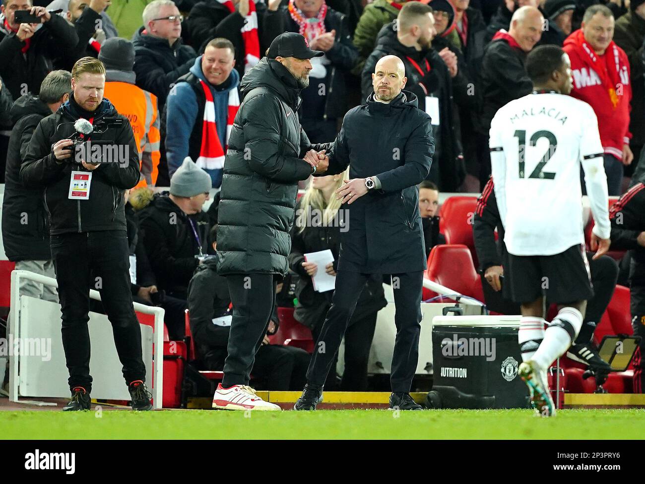 Liverpool Manager Jurgen Klopp And Manchester United Manager Erik Ten