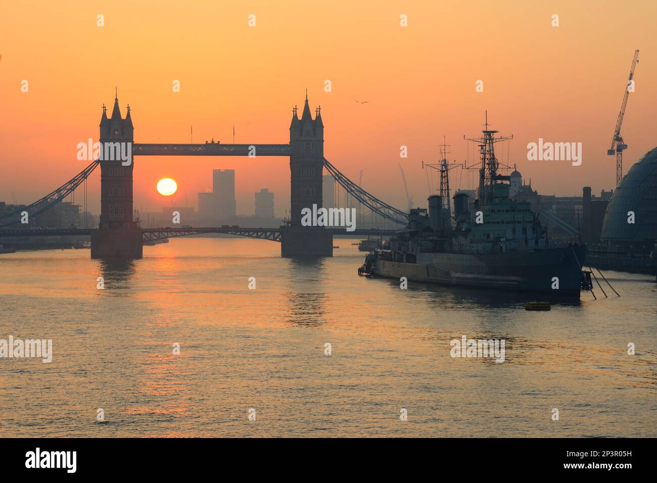 Tower Bridge and HMS Belfast at sunrise, London Stock Photo - Alamy