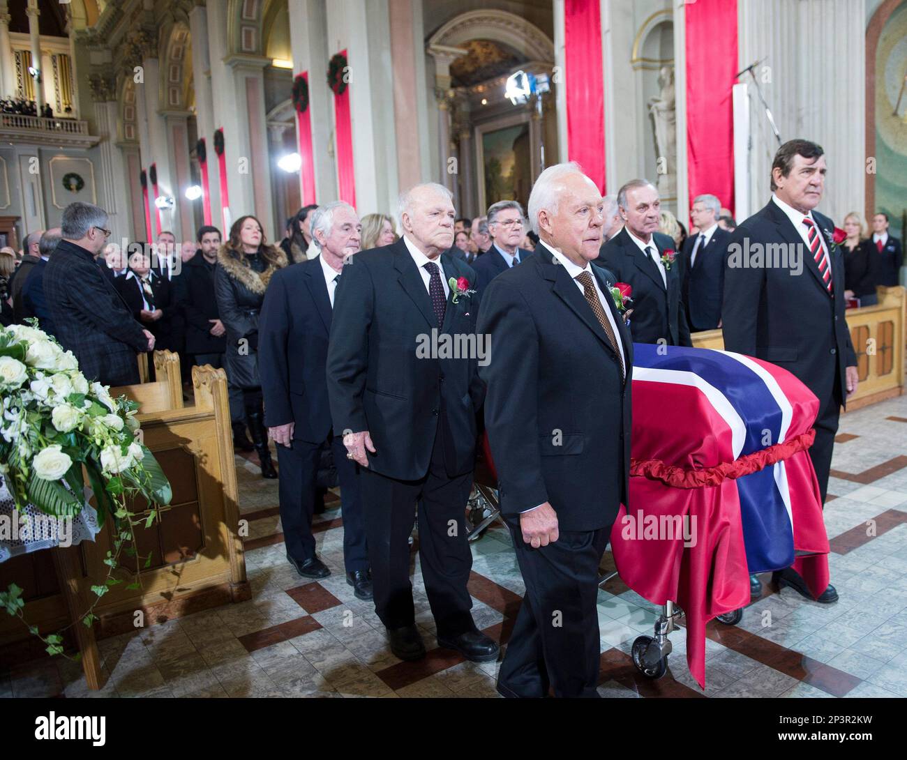 THIS CORRECTS THE NAME OF THE PALL BEARER AT FAR LEFT TO BOBBY ROUSSEAU ...