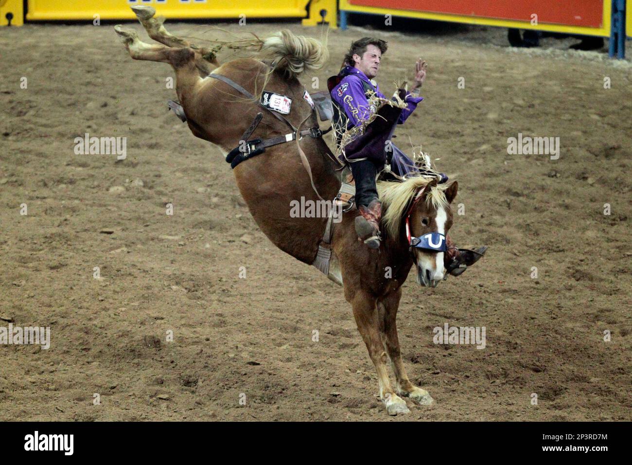 Tilden Hooper competes in bareback riding during the fourth round at ...