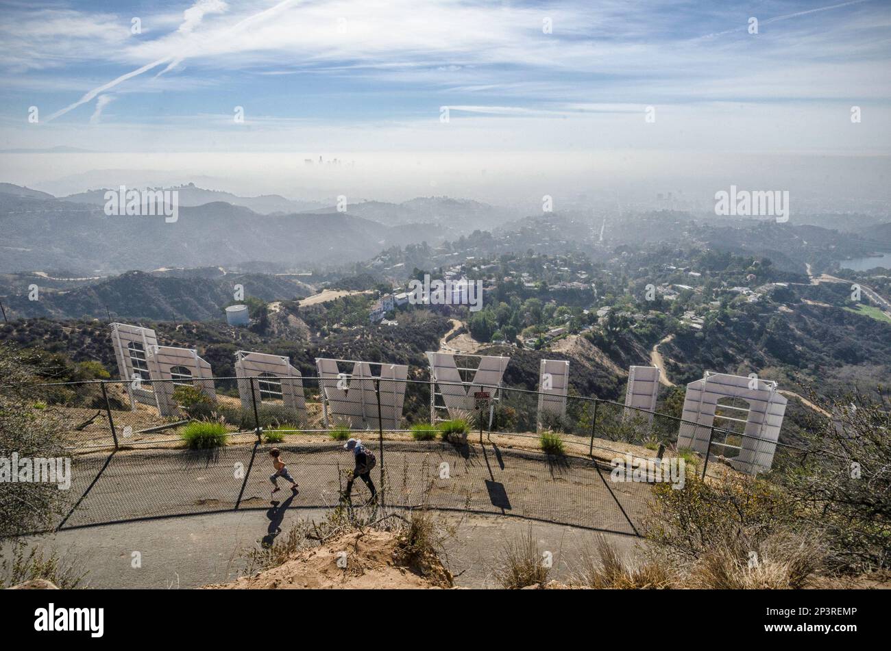 Los Angeles, CA, USA, October 25, 2013: A mother and child walk up ...