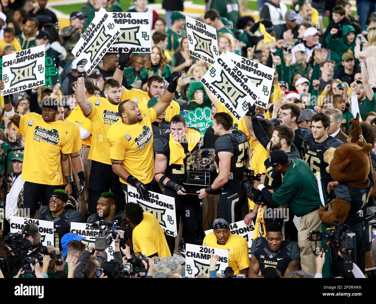 Baylor players celebrate their Big 12 Championship trophy after their ...